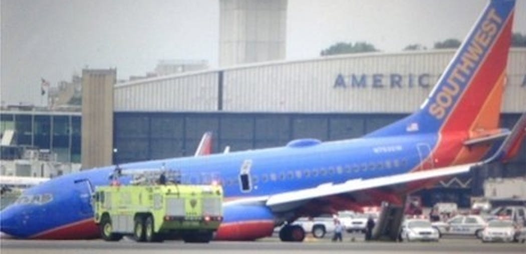 NTSB: Southwest Flight 345 Boeing 737 landing gear collapsed causing ...