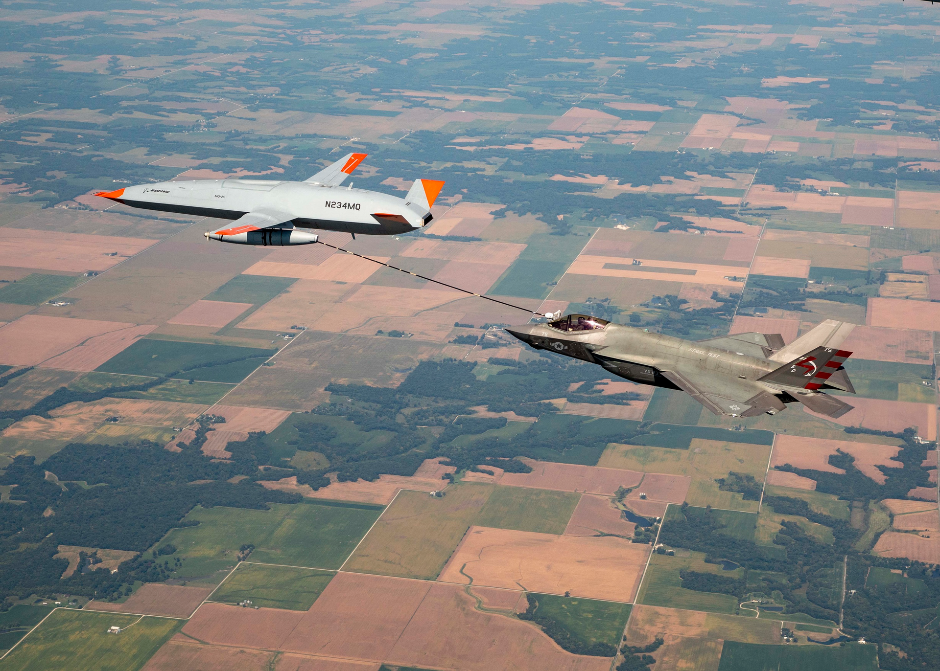 U.S. Navy, Boeing conduct first MQ-25 refueling mission with F-35C ...